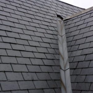 Het strakke en vlakke uiterlijk van een leien dakbedekking - M. van der ...